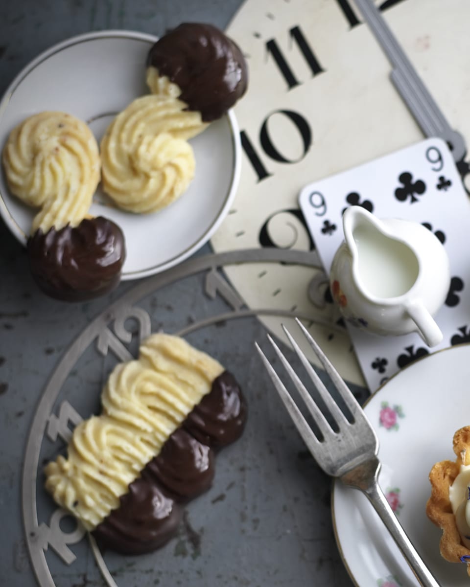Chocolate-dipped Viennese whirls recipe | delicious. magazine