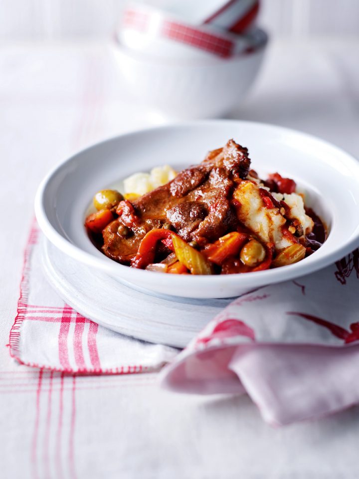 Spanish-style pork with olives and peppers - delicious. magazine