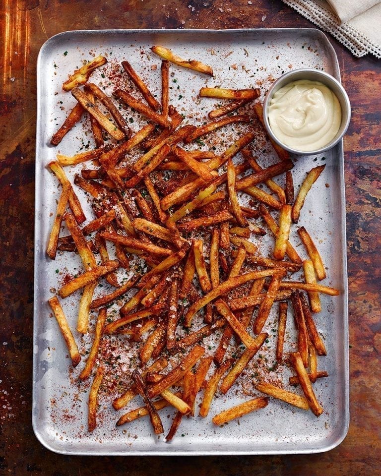 Chips with spiced salt and smoked garlic mayo recipe | delicious. magazine