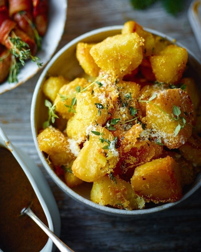 Extra-crunchy parmesan roasties recipe | delicious. magazine