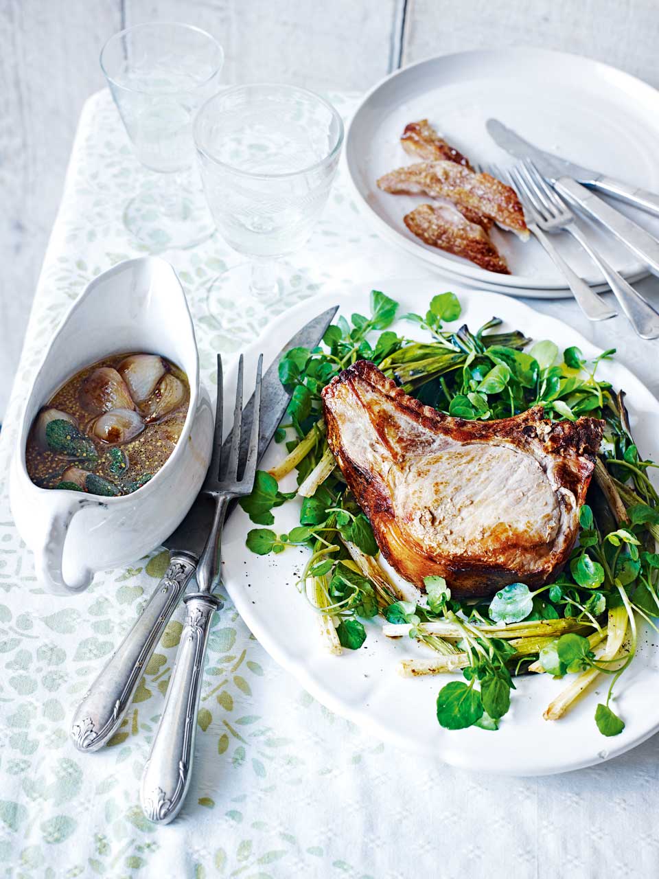 Pork rib chops with garlic and sage sauce recipe | delicious. magazine