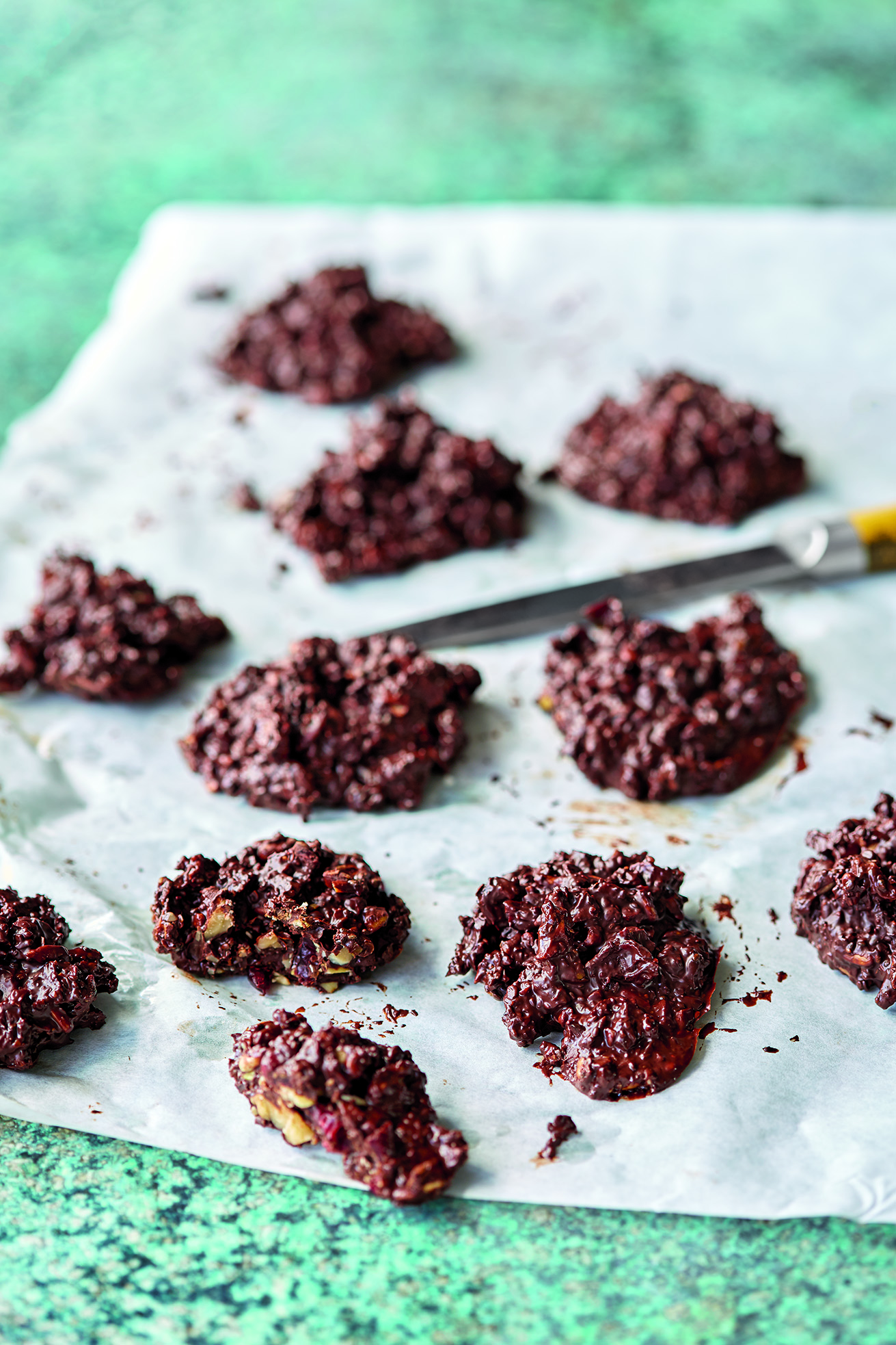 Dark chocolate clusters with walnuts, cranberries and seeds