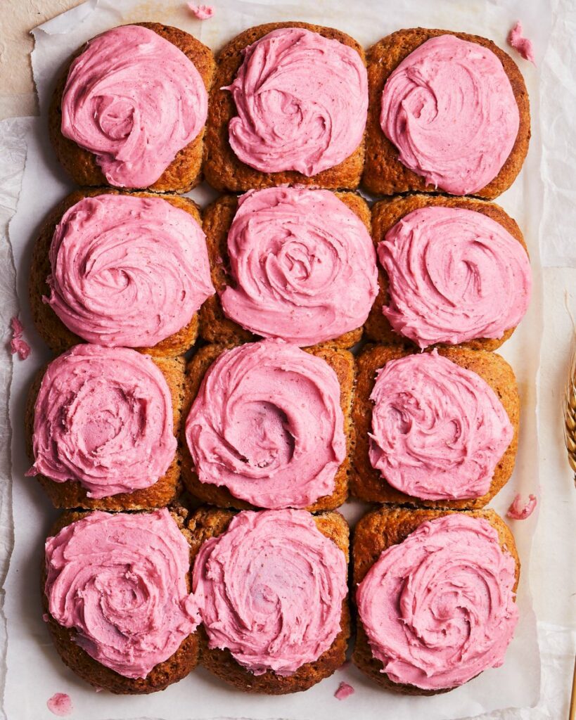 Malt iced buns with raspberry icing - delicious. magazine